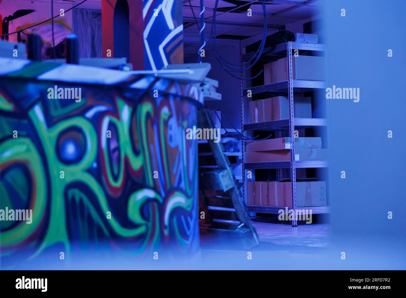 Grungy deserted room covered in graffiti spray paint, artwork ...