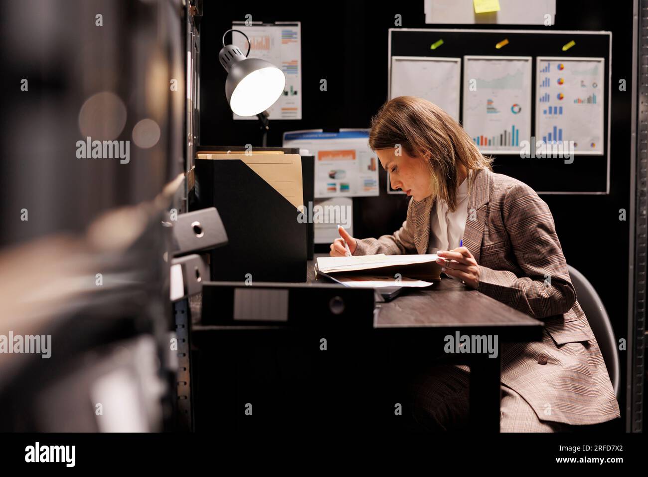 Police officer working in control room hi-res stock photography and ...