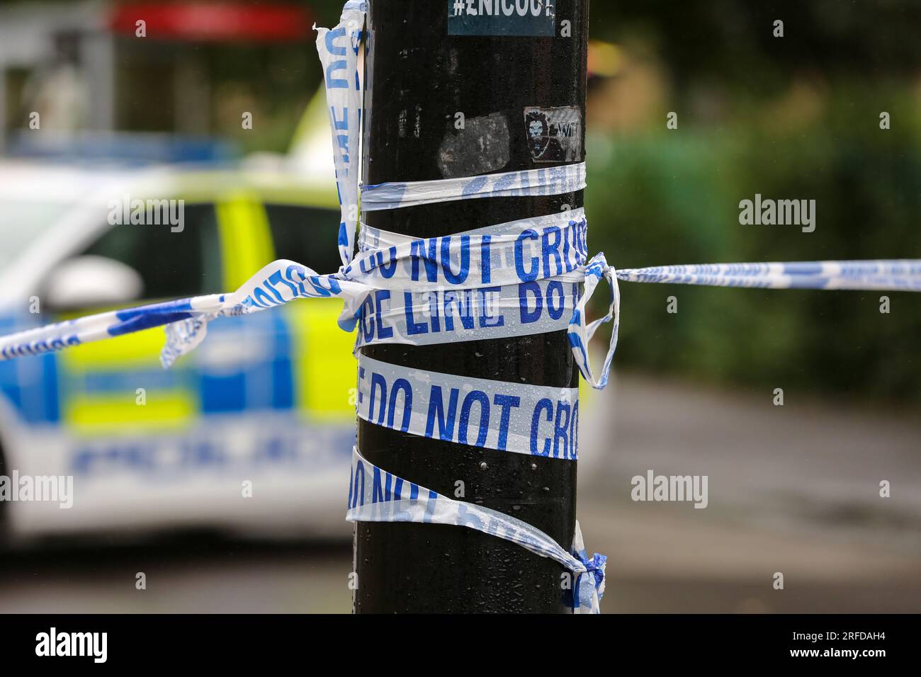 Police tape seen at the crime scene in London Stock Photo - Alamy