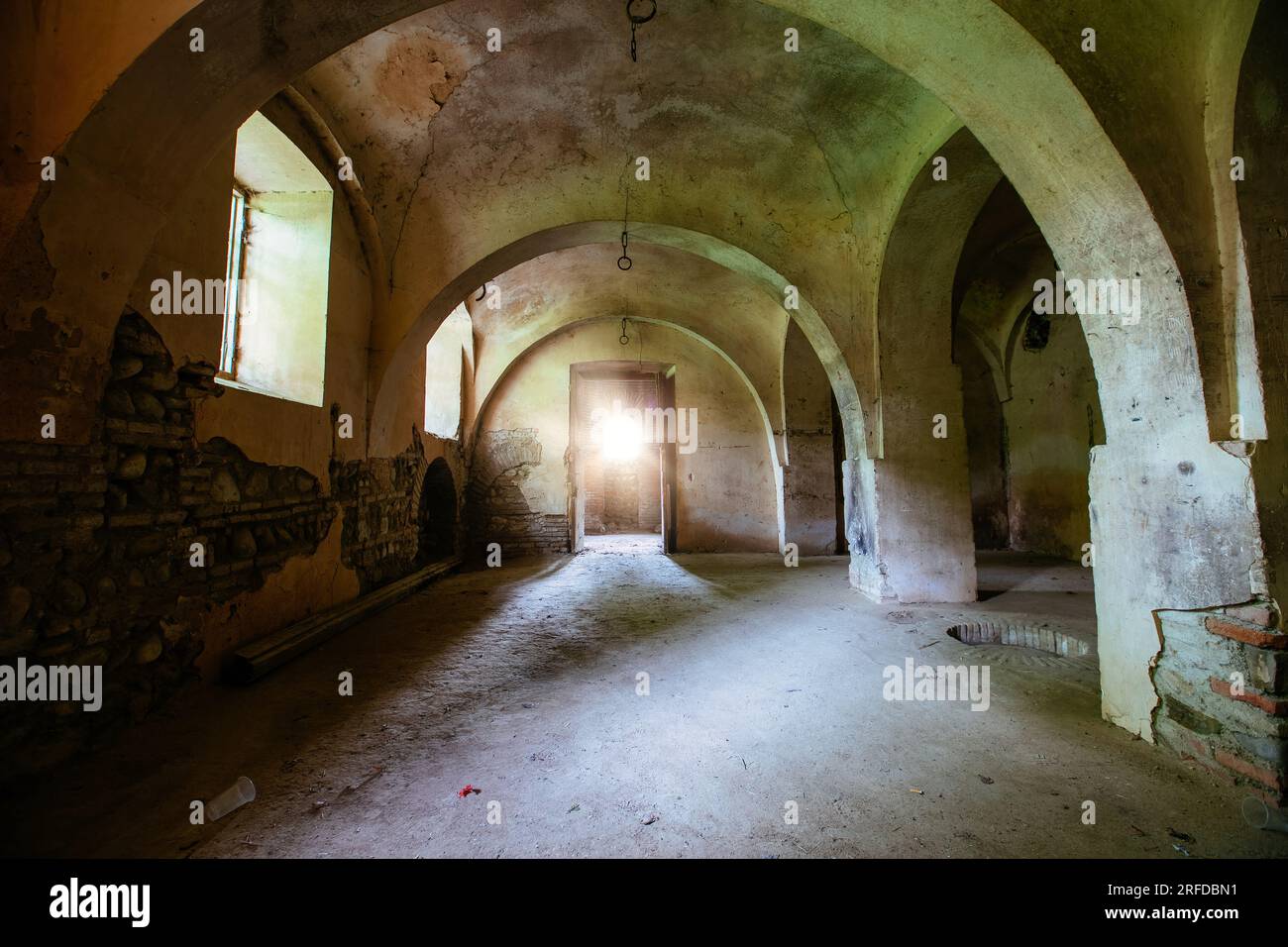 Old vaulted basement under abandoned castle Stock Photo - Alamy