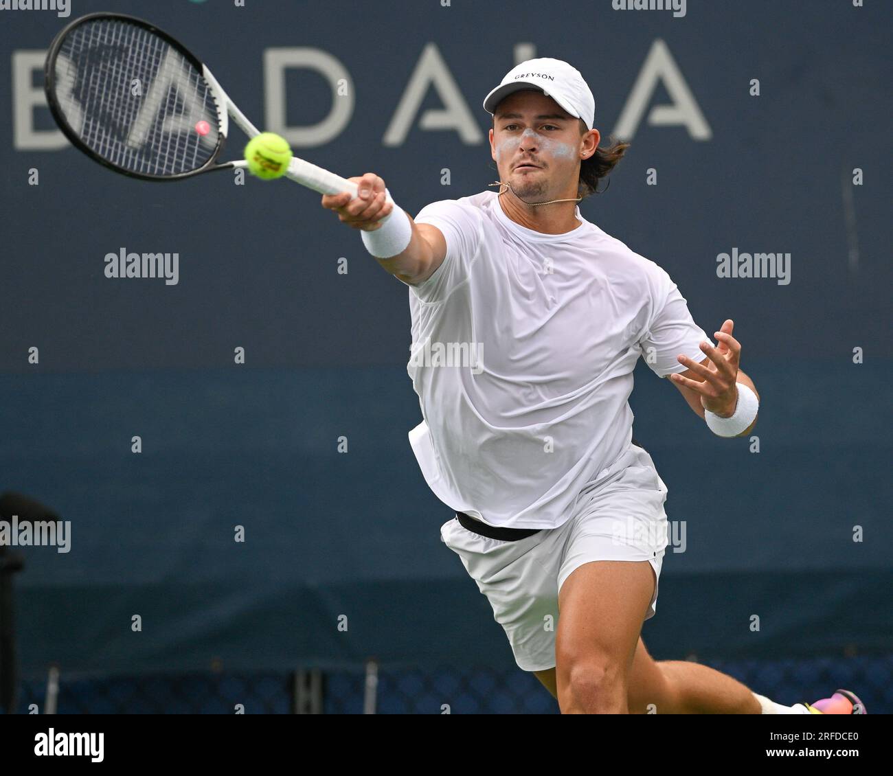 Washington, D.C, USA. 30th July, 2021. J.J. WOLF hits a forehand during ...
