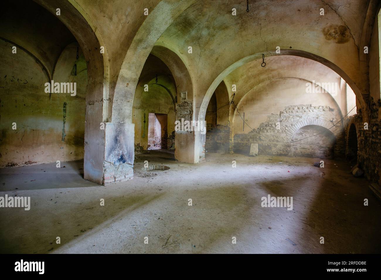 Old vaulted basement under abandoned castle Stock Photo - Alamy