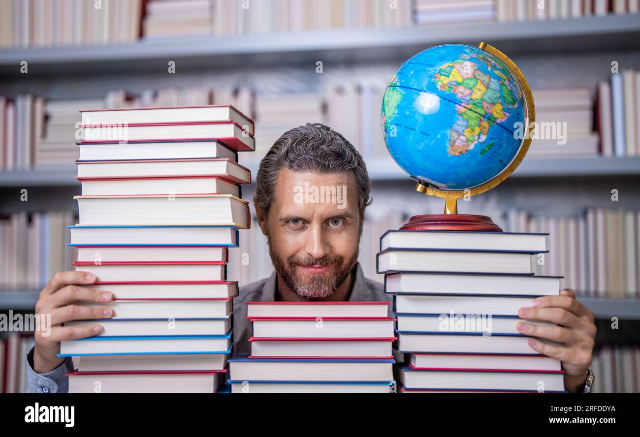 nerd man in classroom. bookworm in school library. education and ...