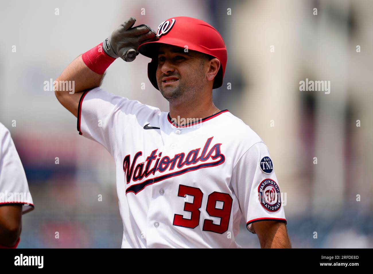 Washington Nationals third baseman Jake Alu (39) reacts after hitting ...
