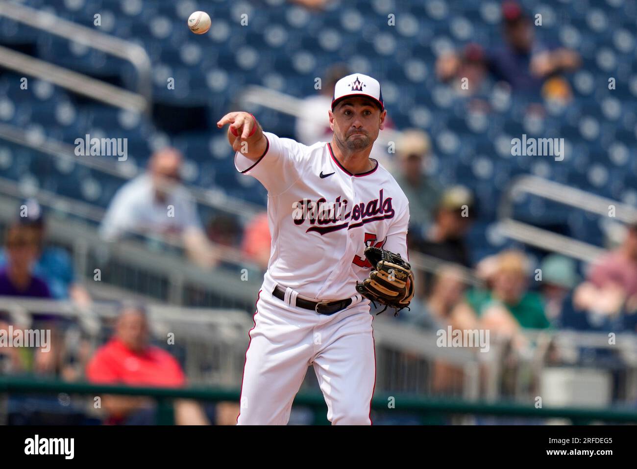 Washington Nationals third baseman Jake Alu (39) throws to first base ...