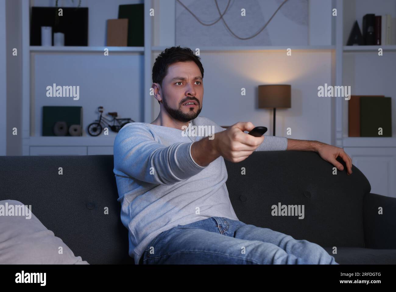 Changing channels man hi-res stock photography and images - Alamy