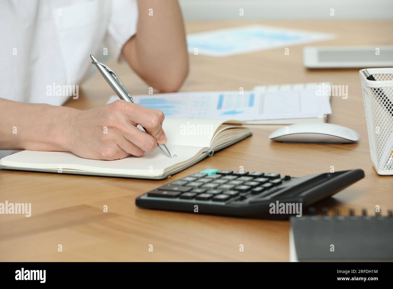 Accountant writing hi-res stock photography and images - Alamy
