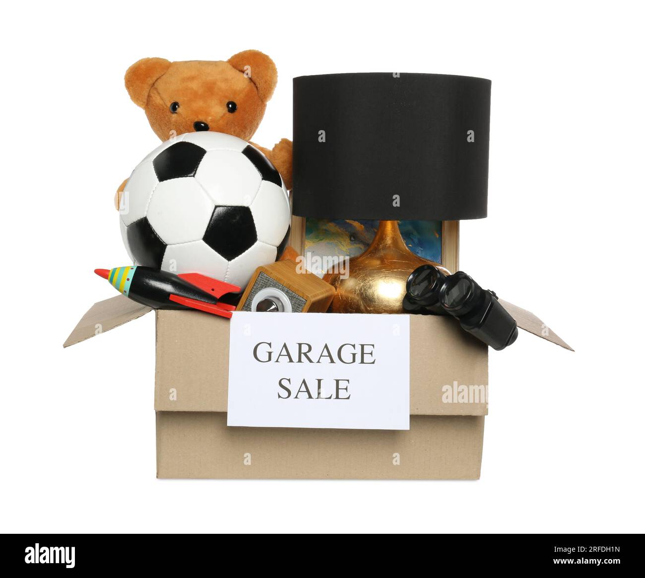 Sign Garage Sale written on box with different stuff isolated on white ...