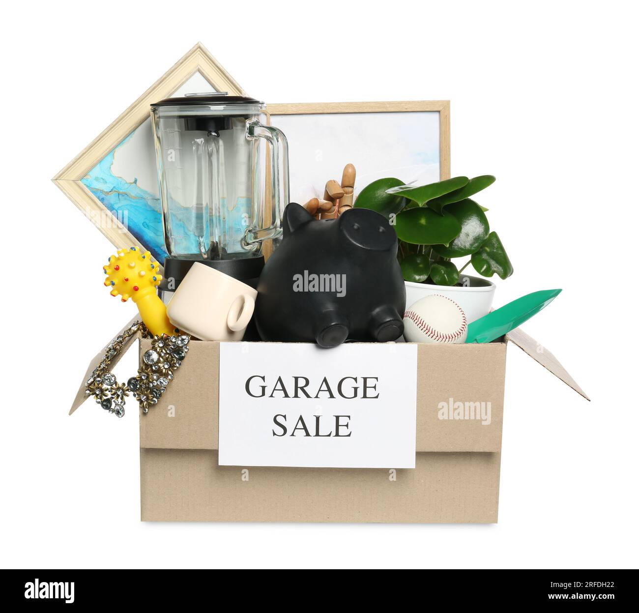 Different stuff in box with sign Garage Sale isolated on white Stock ...