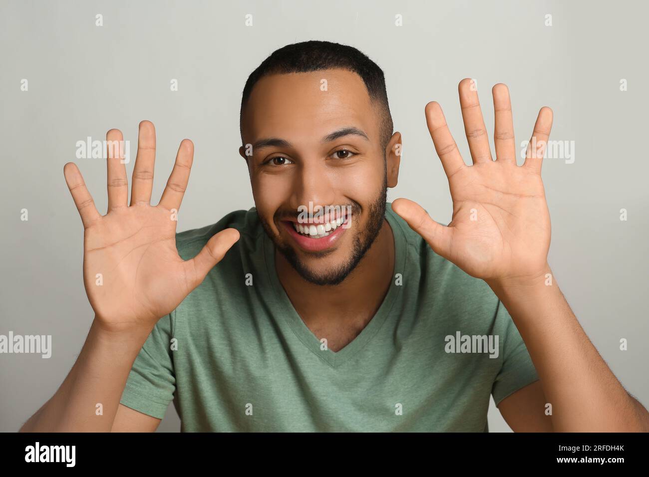 Happy man stuck to transparent screen. Internet addiction concept Stock ...