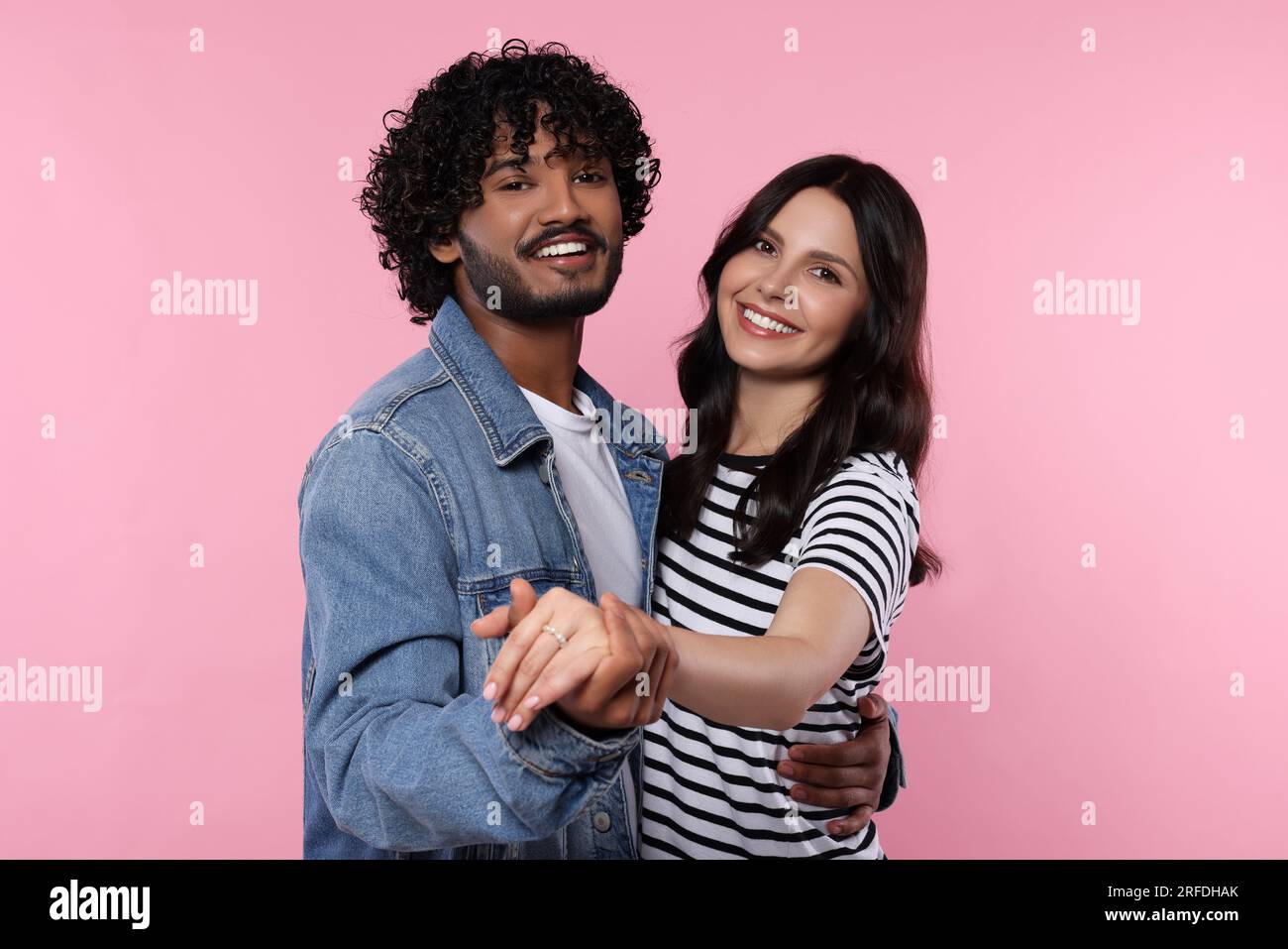 Happy multiracial man woman dancing hi-res stock photography and images ...