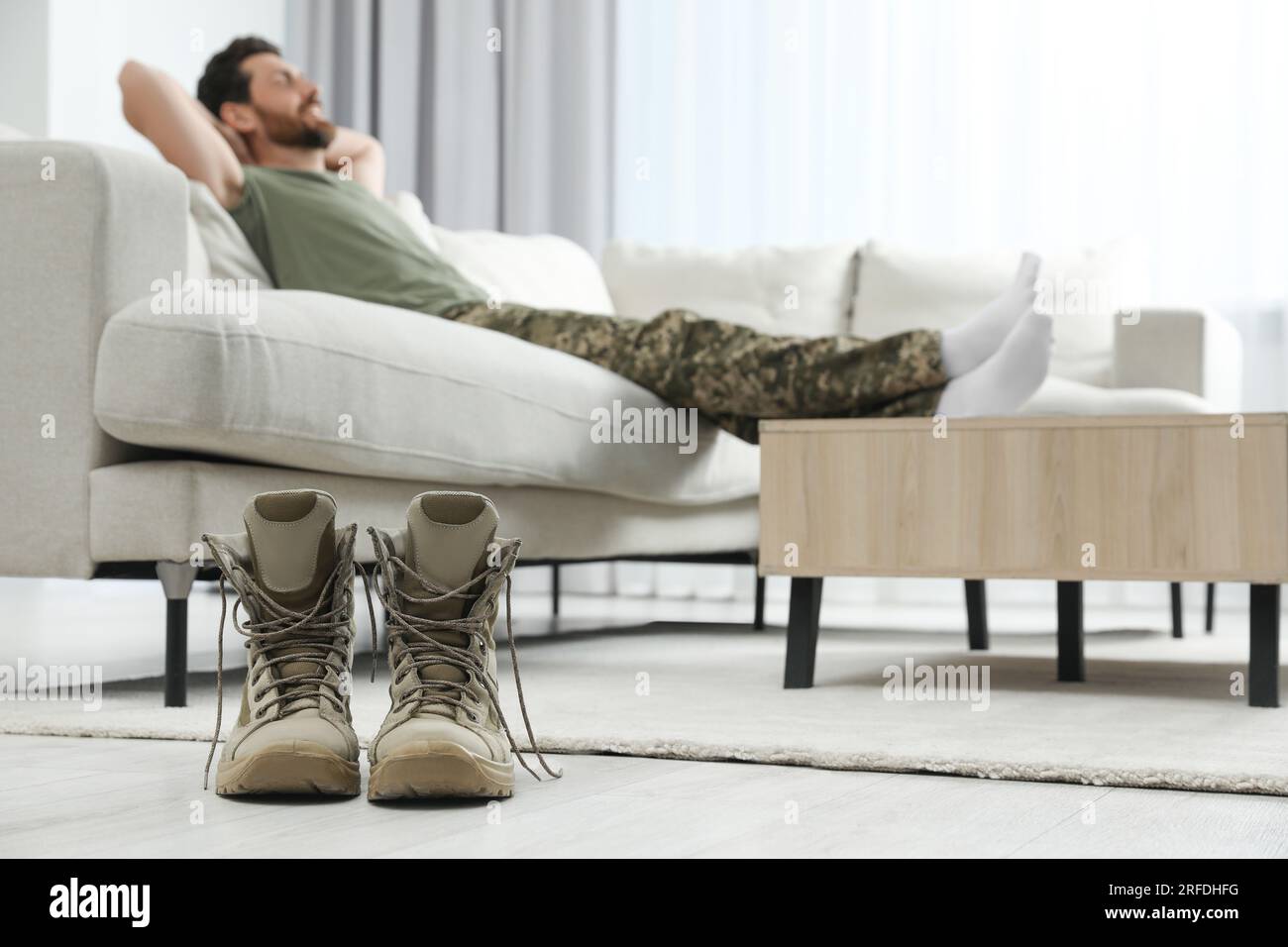 Soldier relaxing on sofa hi-res stock photography and images - Alamy