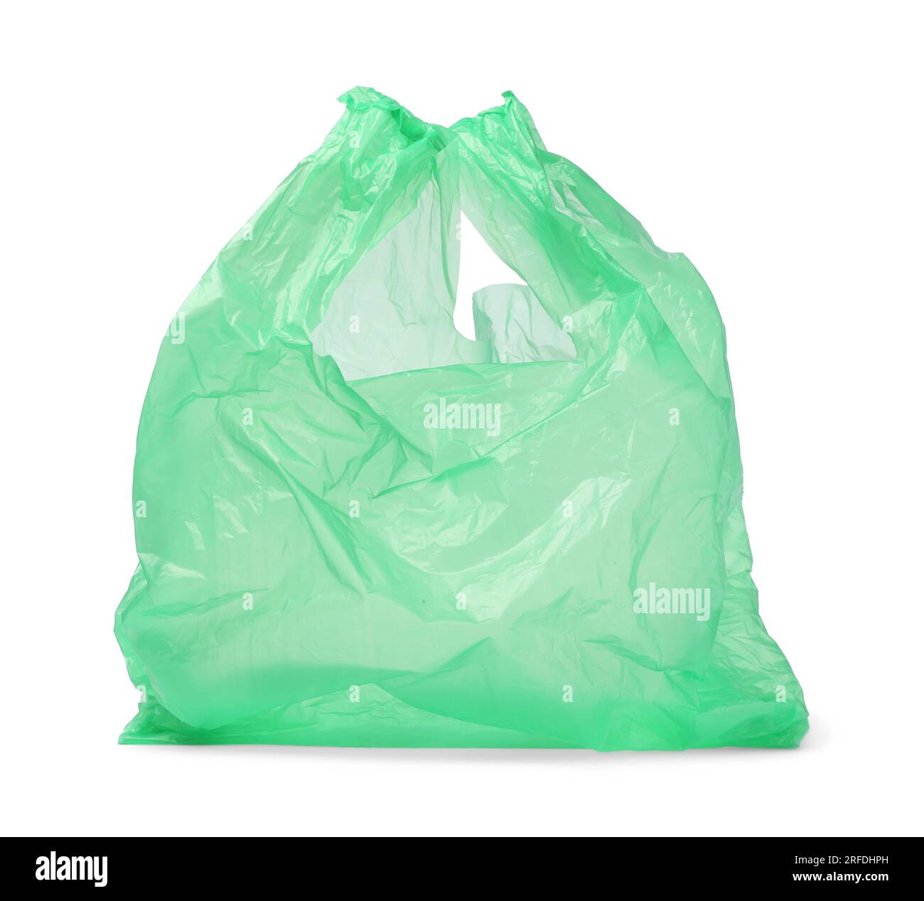 One green plastic bag isolated on white Stock Photo - Alamy