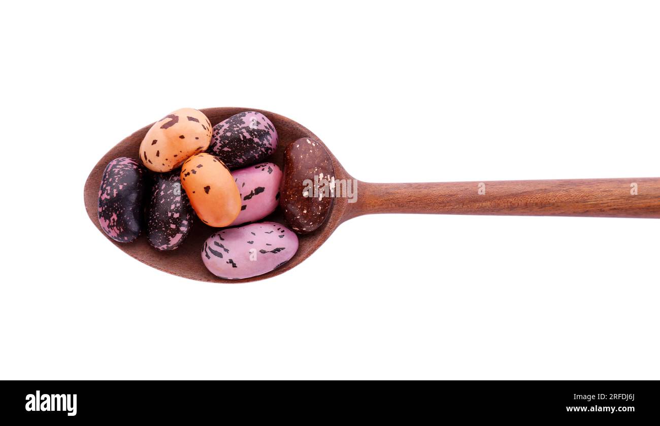Wooden spoon with dry kidney beans isolated on white, top view Stock ...