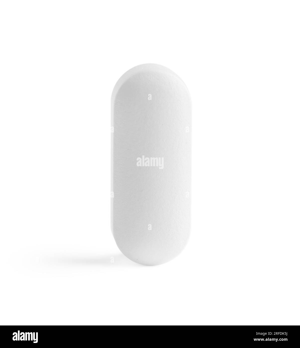 One pill on white background. Medicinal treatment Stock Photo - Alamy