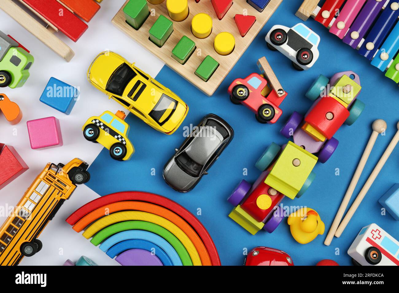 Different children's toys on color background, flat lay Stock Photo - Alamy