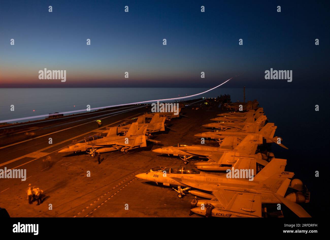 Aircraft attached to Carrier Air Wing (CVW) 8 conduct flight operations ...