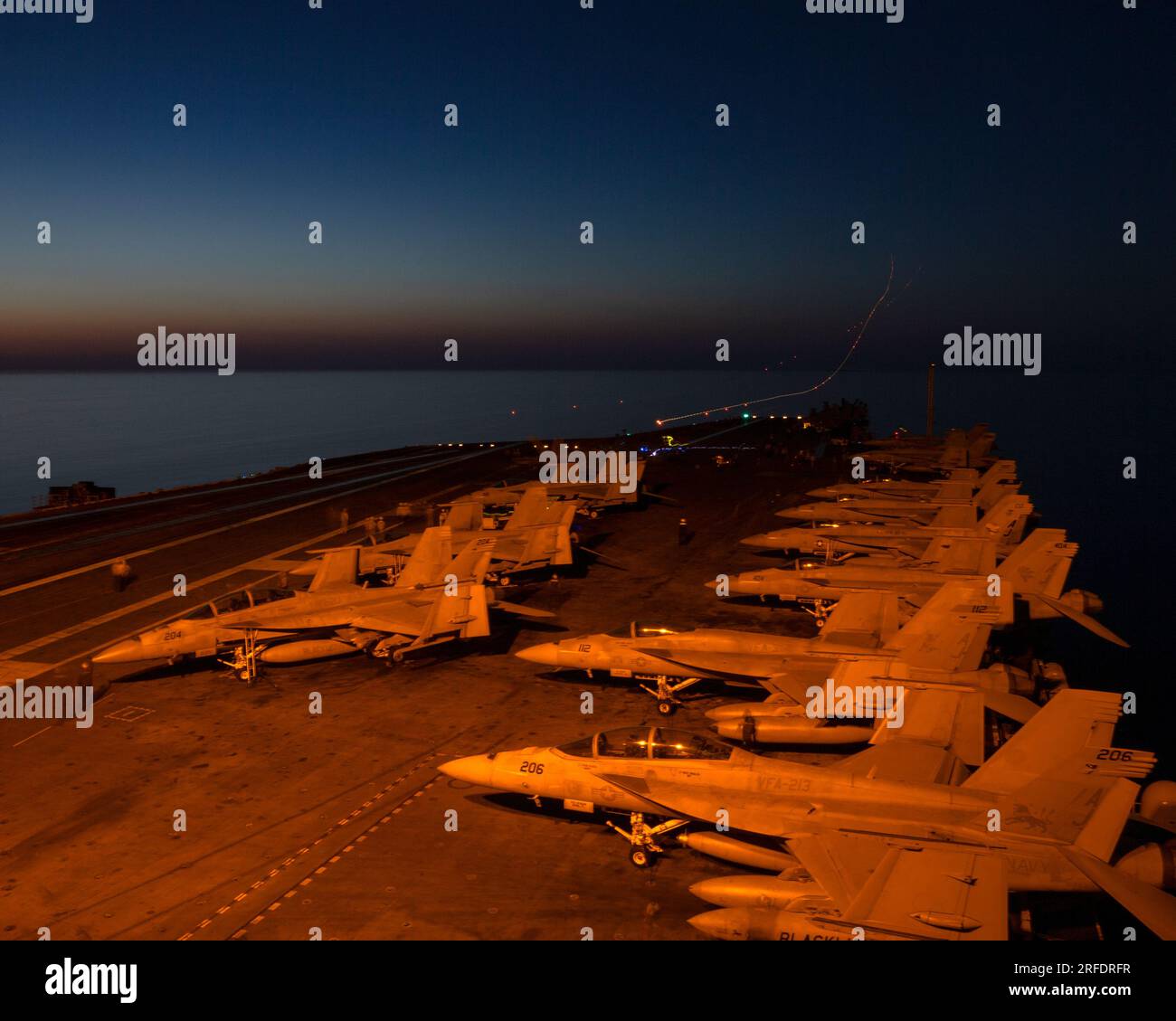 Aircraft attached to Carrier Air Wing (CVW) 8 conduct flight operations ...