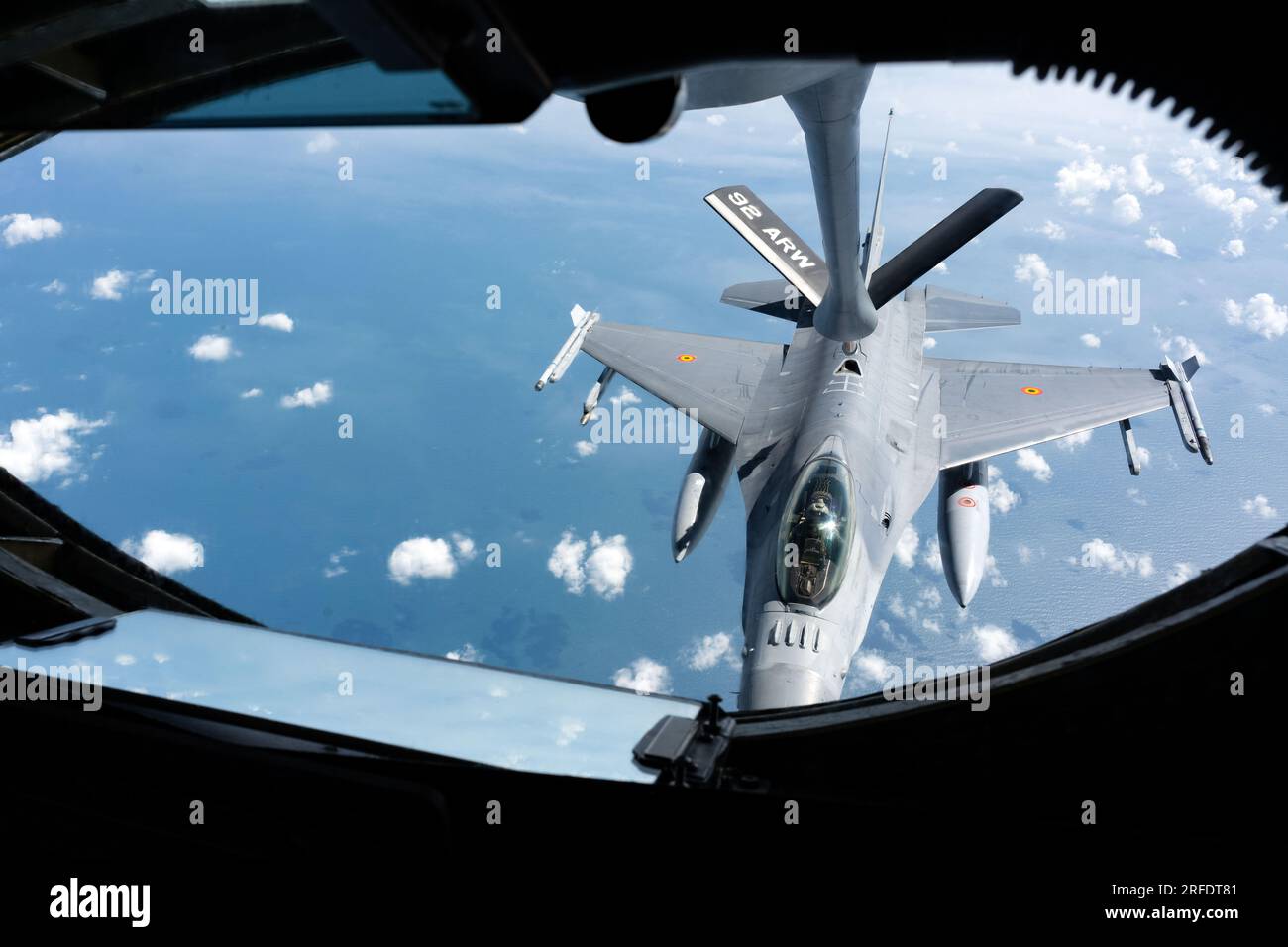 A Belgian Air Force F-16 gets refueled over the North Sea July 25, 2023 ...