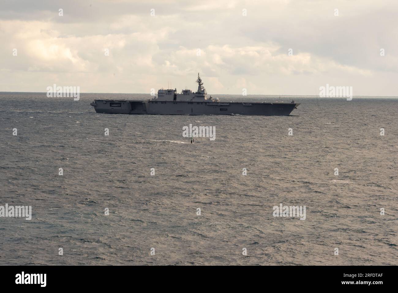 CORAL SEA (July 24, 2023) A U.S. submarine comes to periscope depth ...