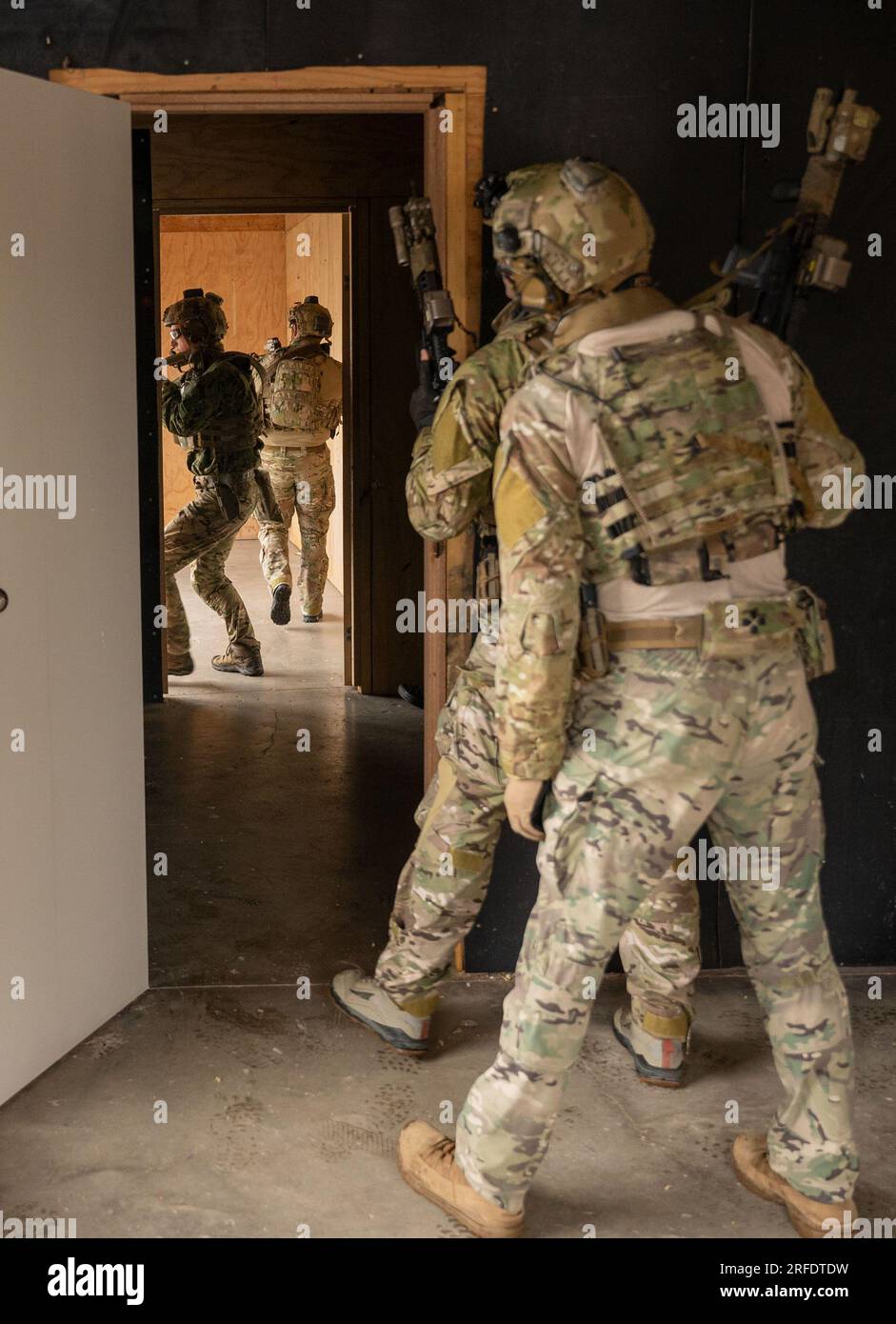 230628-N-OX430-1166 U.S. Naval Special Warfare operators clear rooms ...