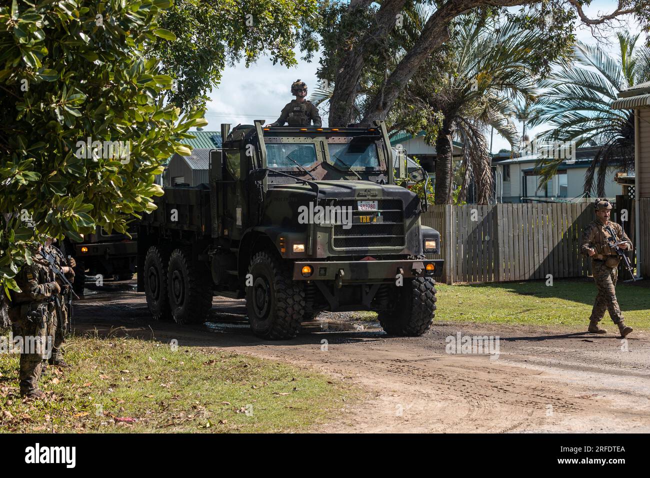 U.S. Marines with Battalion Landing Team 2/1, drive medium tactical ...