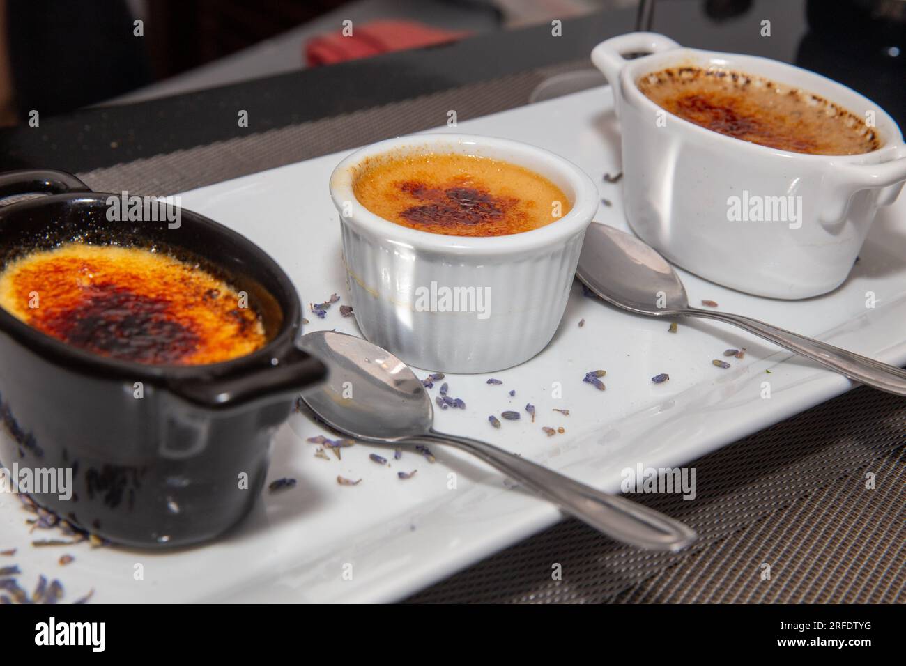 Trio of different types of Creme Brulee Stock Photo - Alamy
