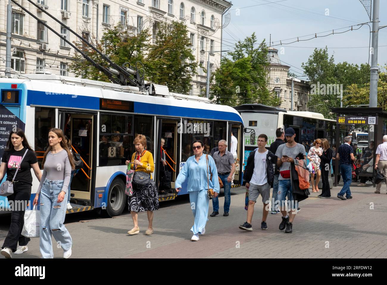 A trolleybus collects passengers at a bus stop in St Stephen Boulevard ...