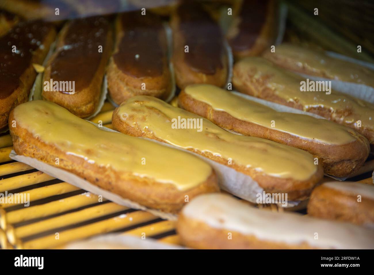 freshly baked various types of eclairs Stock Photo - Alamy