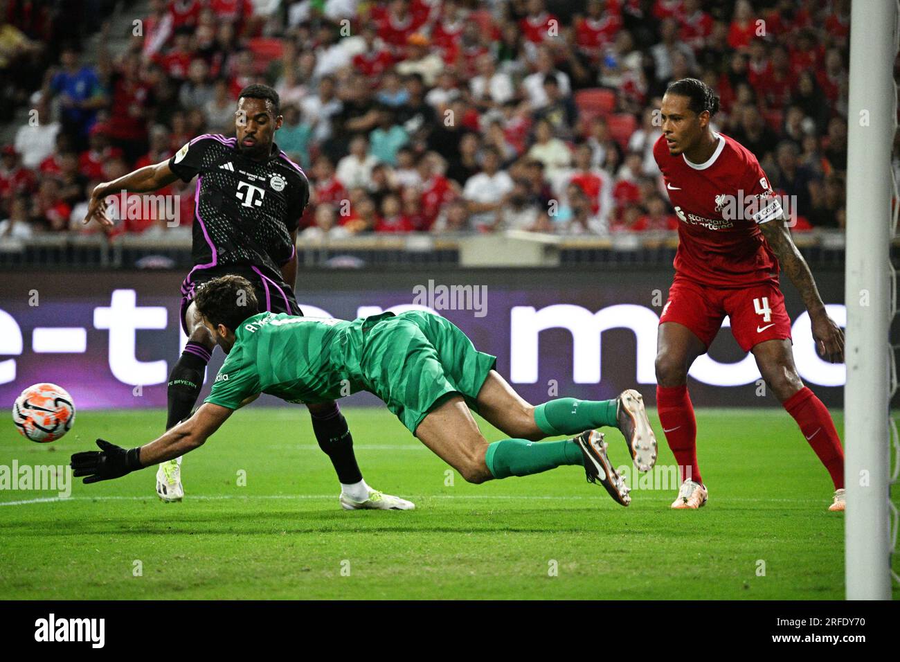 Singapore. 2nd Aug, 2023. Liverpool's goalkeeper Alisson Becker (front ...