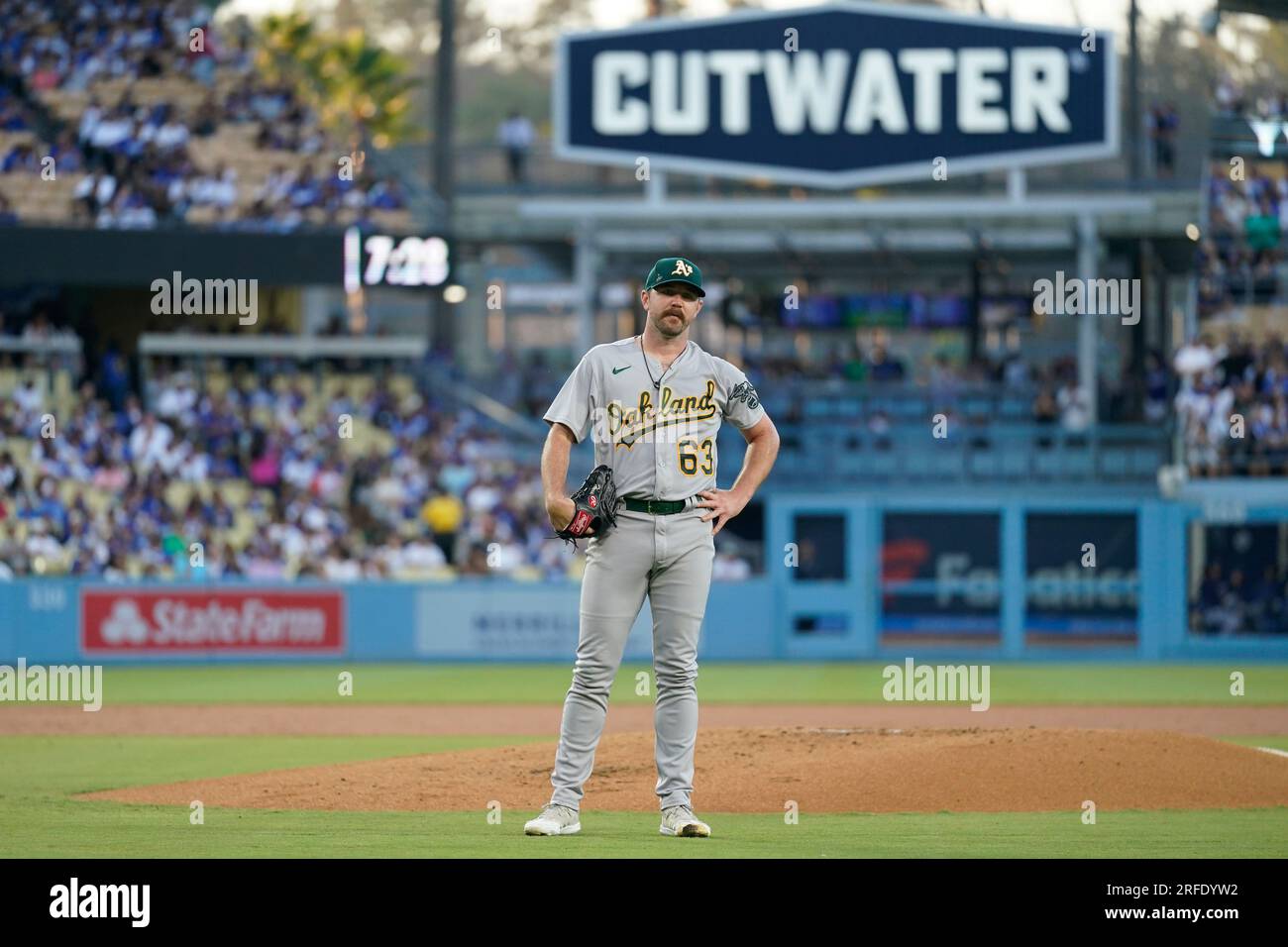 Oakland Athletics starting pitcher Hogan Harris (63) reacts after ...