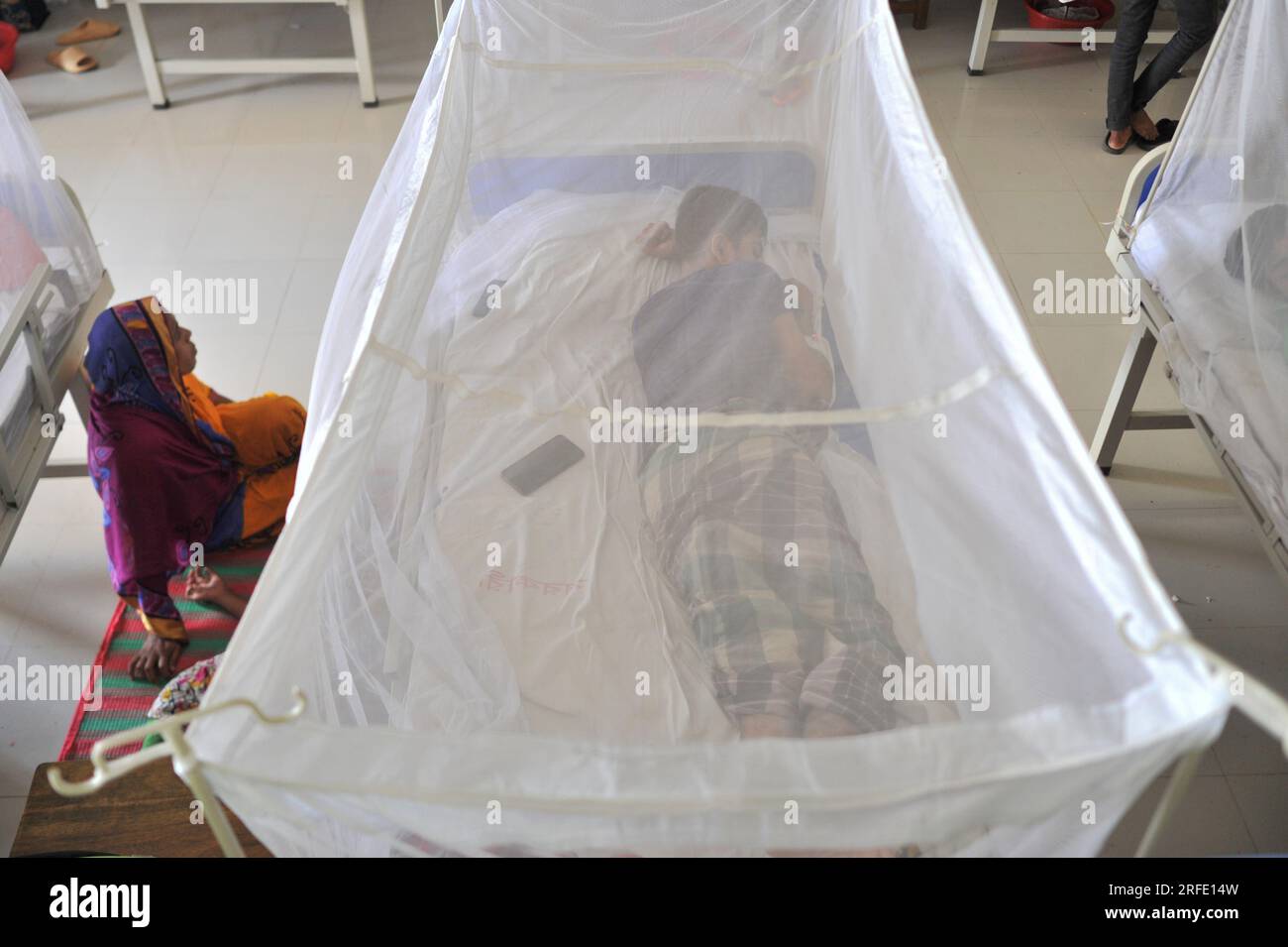 People with dengue receive treatment at the Dengue ward of the Sylhet ...