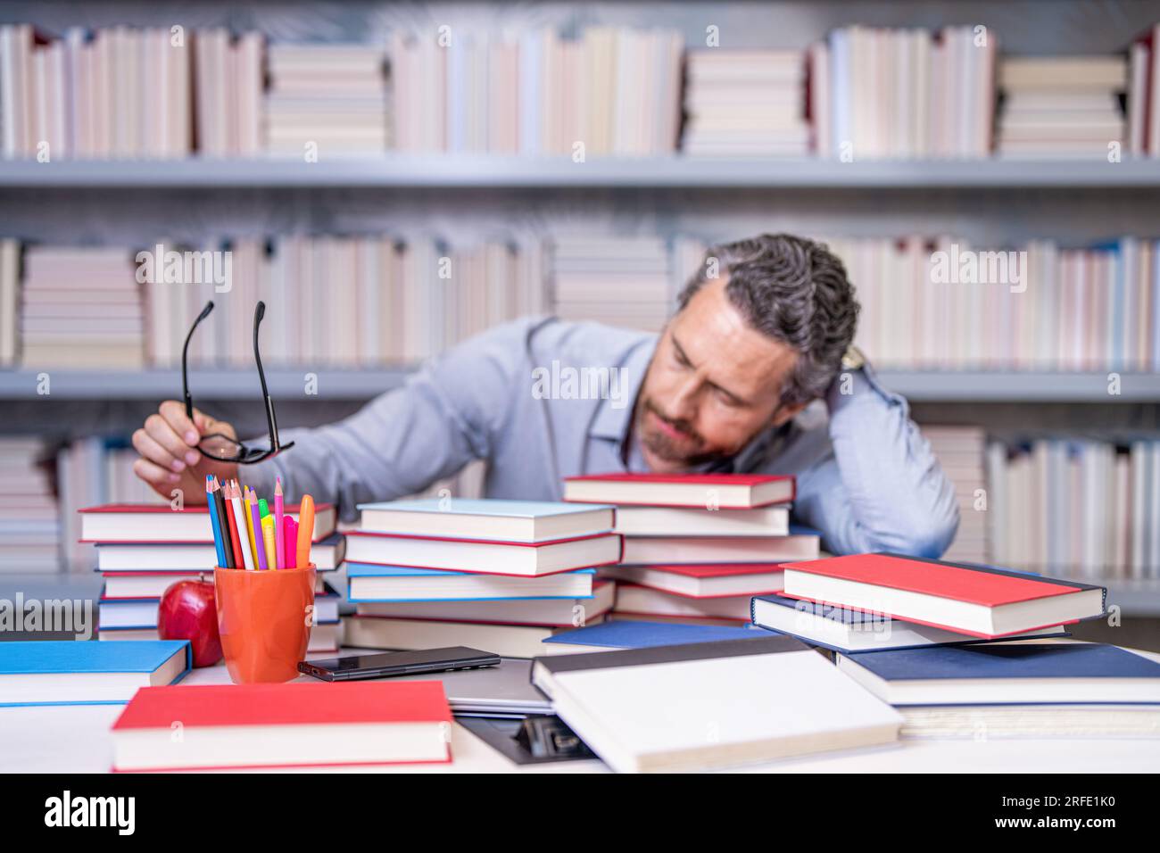 overworked professor at lesson. school professor with books. teachers ...