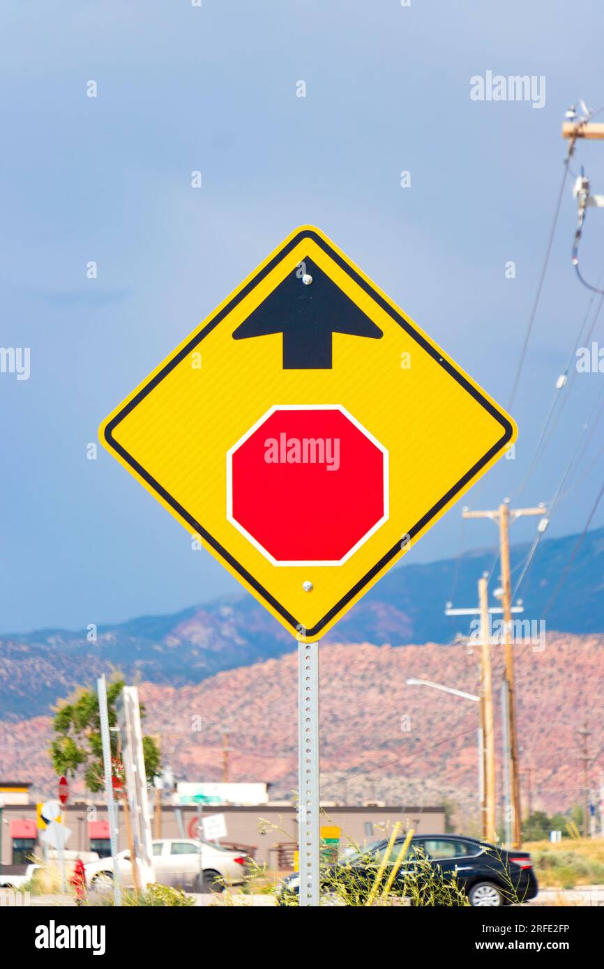 yellow diamond traffic sign traffic must stop ahead in street in Cedar ...