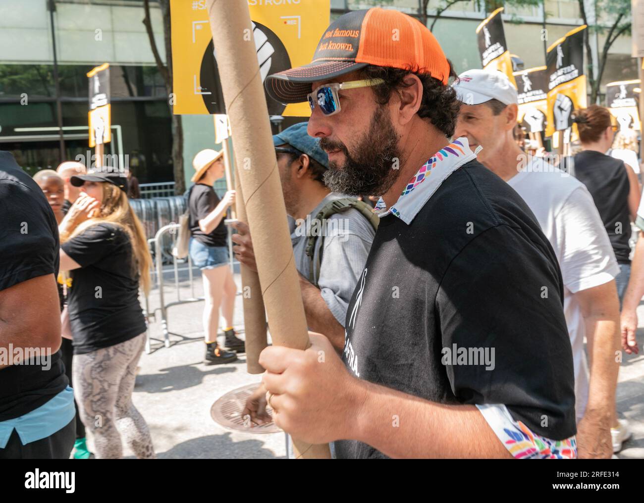 Adam Sandler joined strike workers of WGA and SAG-AFTRA in front of ...