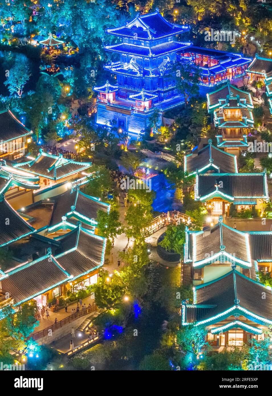 Aerial photo shows people visit Jinling Small City scenic area at night ...