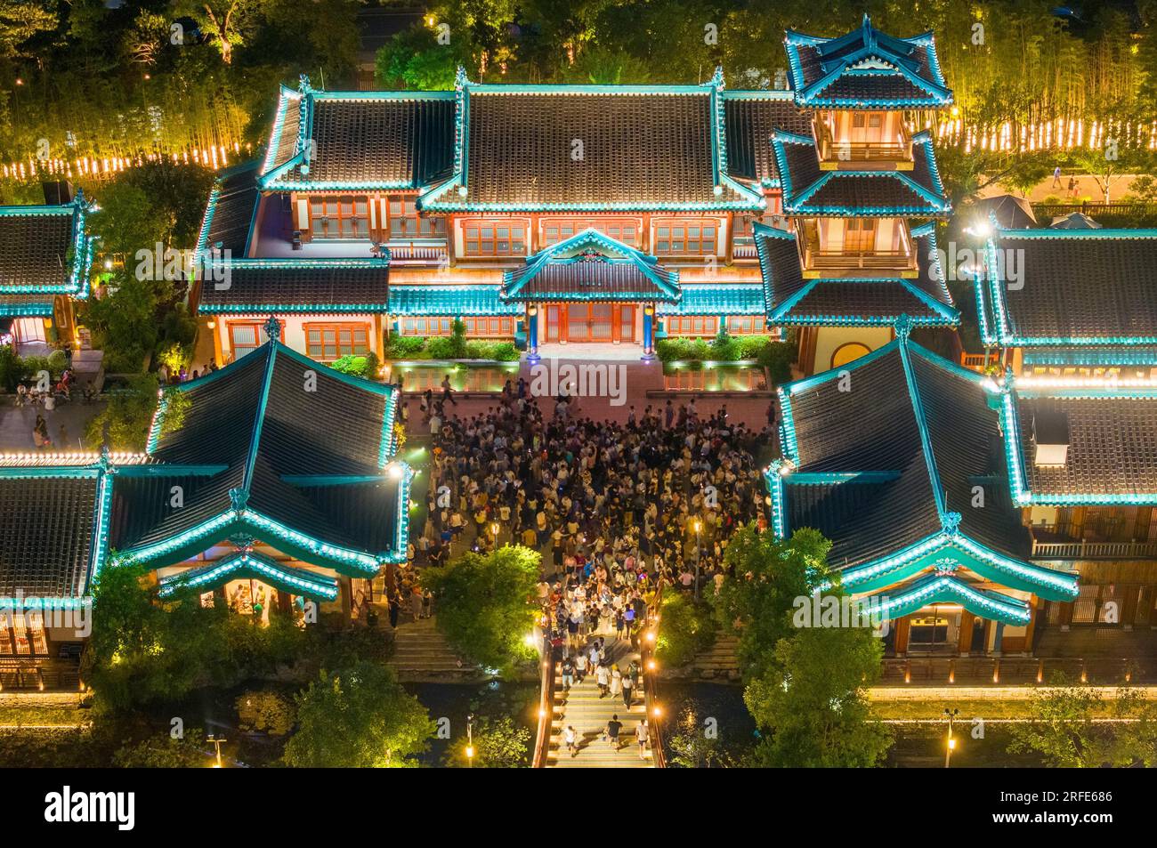 Aerial photo shows people visit Jinling Small City scenic area at night ...
