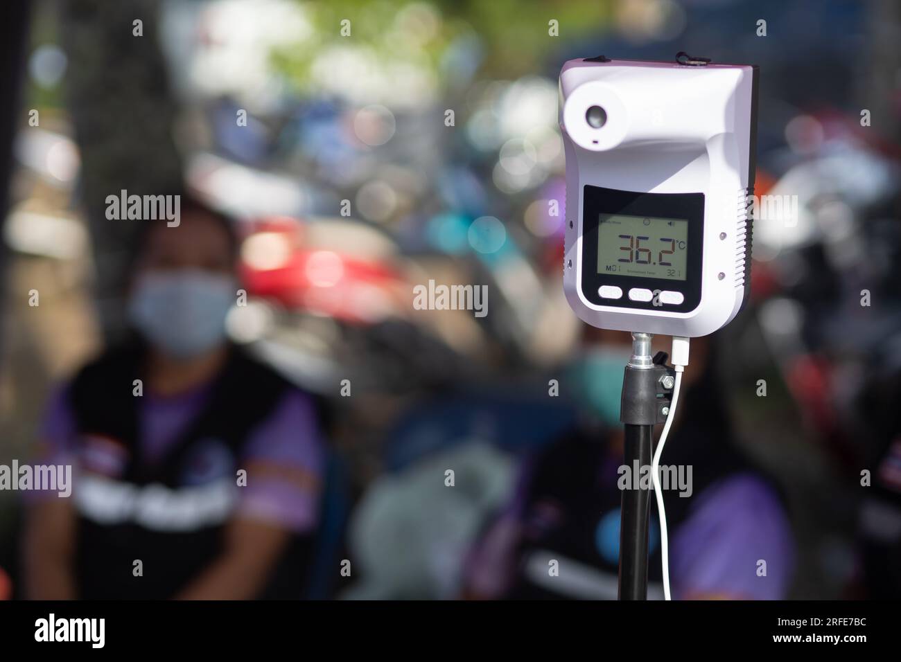 Infrared Thermometer or Handheld Digital Thermometer located in front ...