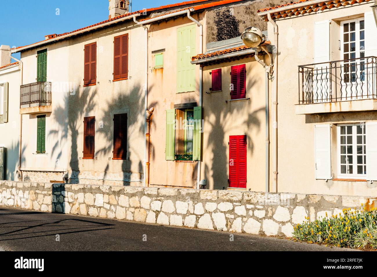 Old European row houses with shuttered windows Antibes, on French ...