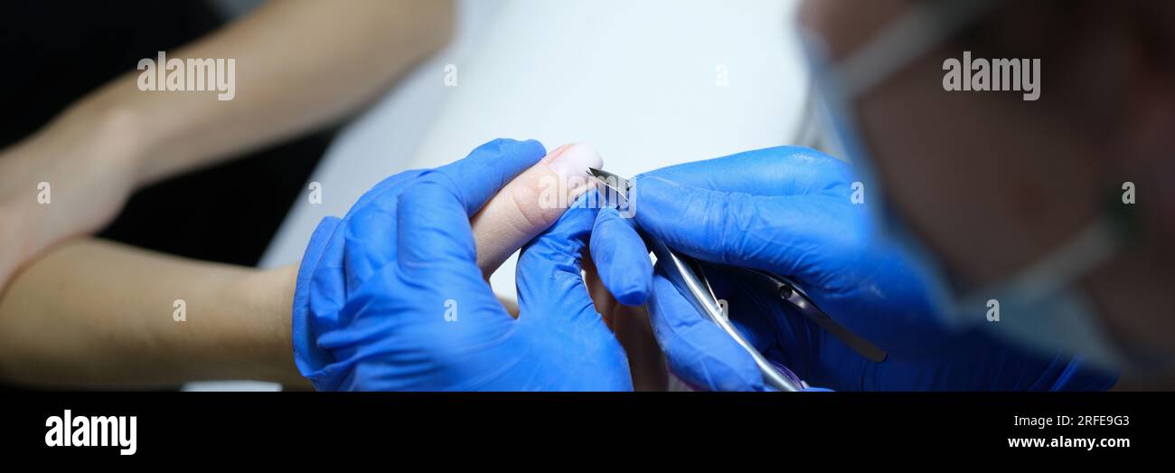 Woman makes manicure client hi-res stock photography and images - Alamy
