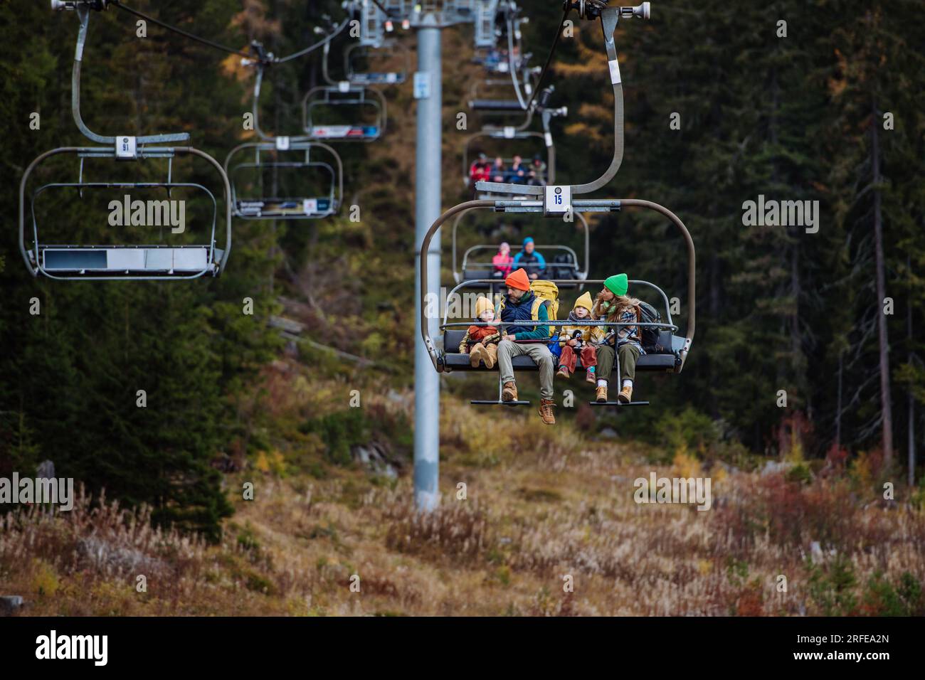 Family sitting inside of cable car and enjoying the view Stock Photo ...