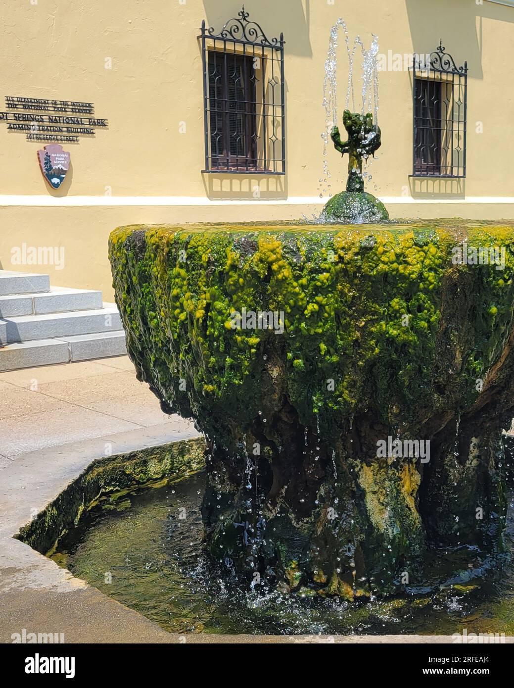A fountain flowing with mineral water from the hot springs. Located in ...