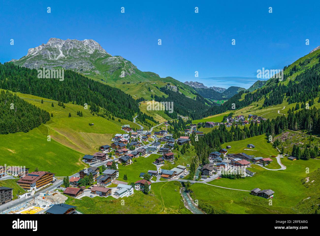 The glamorous mountain resort of Lech am Arlberg in summertime, aerial ...