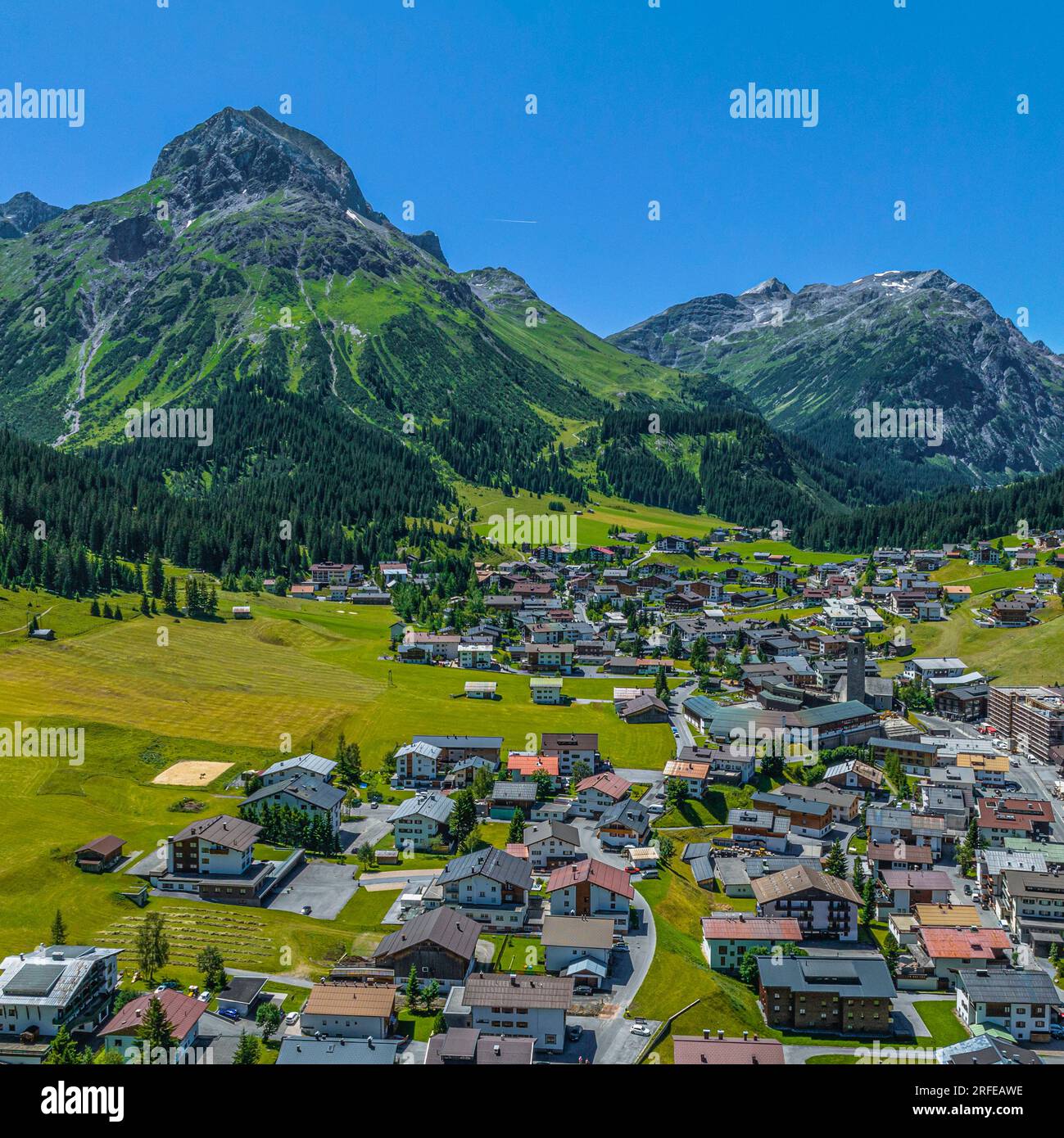The glamorous mountain resort of Lech am Arlberg in summertime, aerial ...