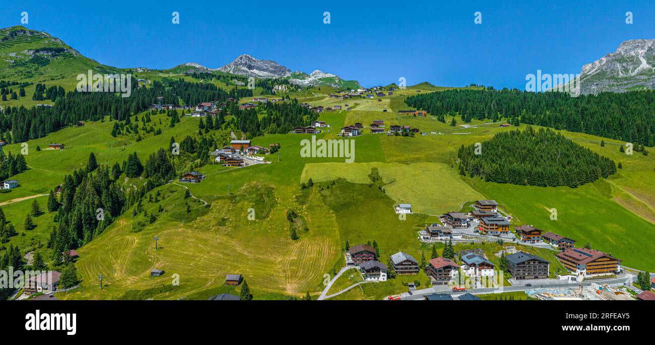The glamorous mountain resort of Lech am Arlberg in summertime, aerial ...