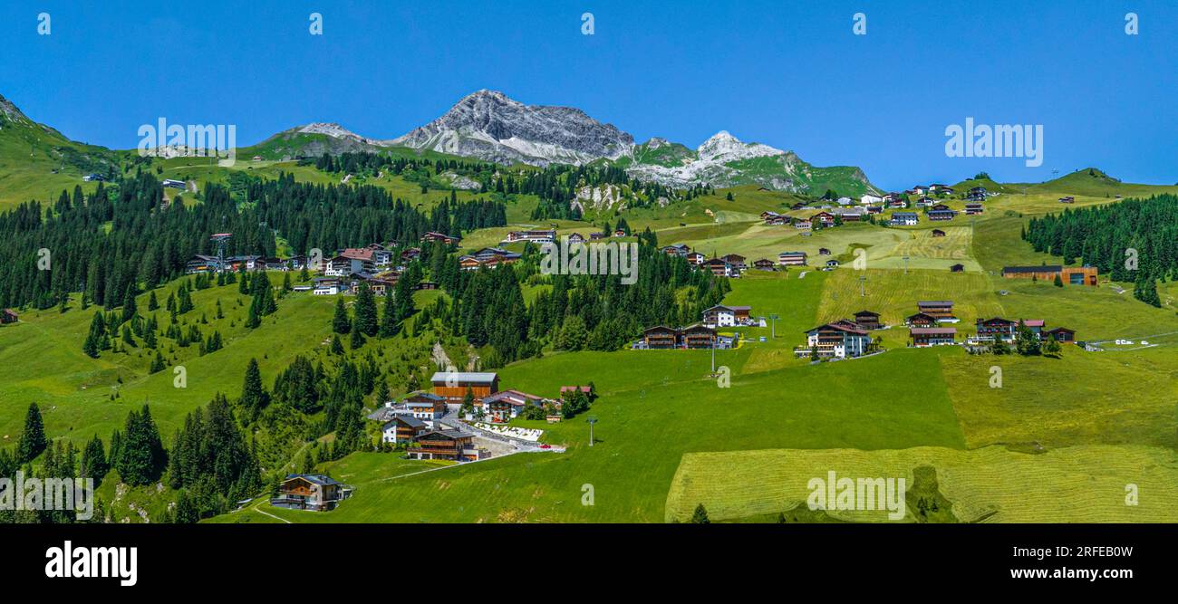 The glamorous mountain resort of Lech am Arlberg in summertime, aerial ...