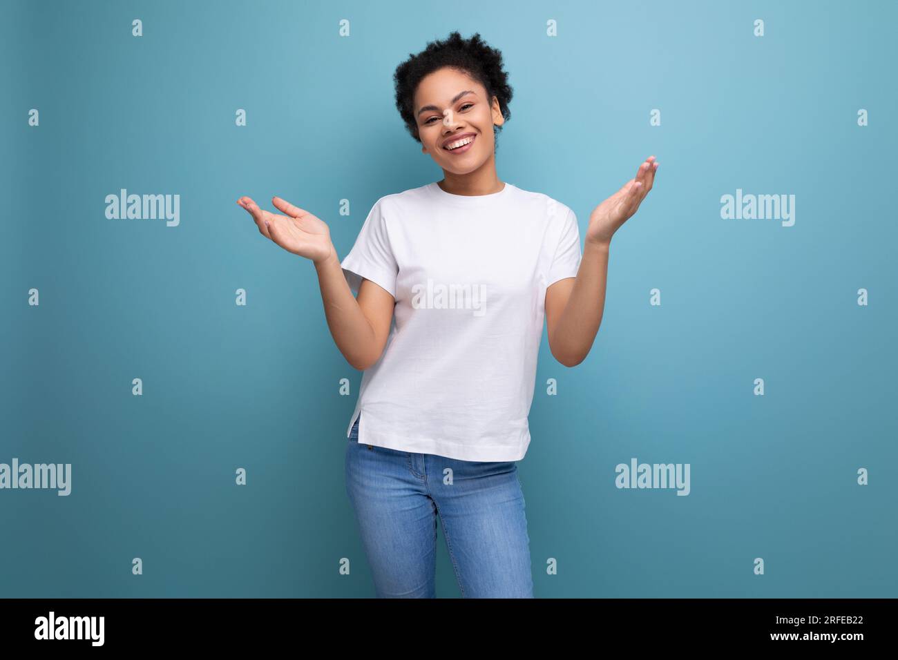 well-groomed beautiful young swarthy woman with fluffy curly hair ...