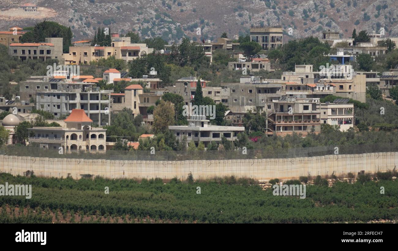 The seven-meter high security wall separating the Lebanese village of ...