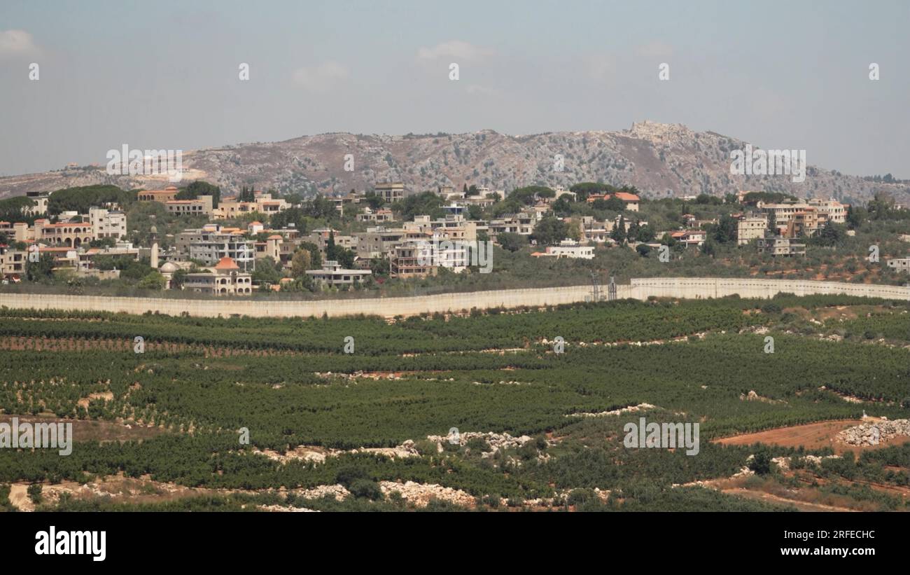 The seven-meter high security wall separating the Lebanese village of ...