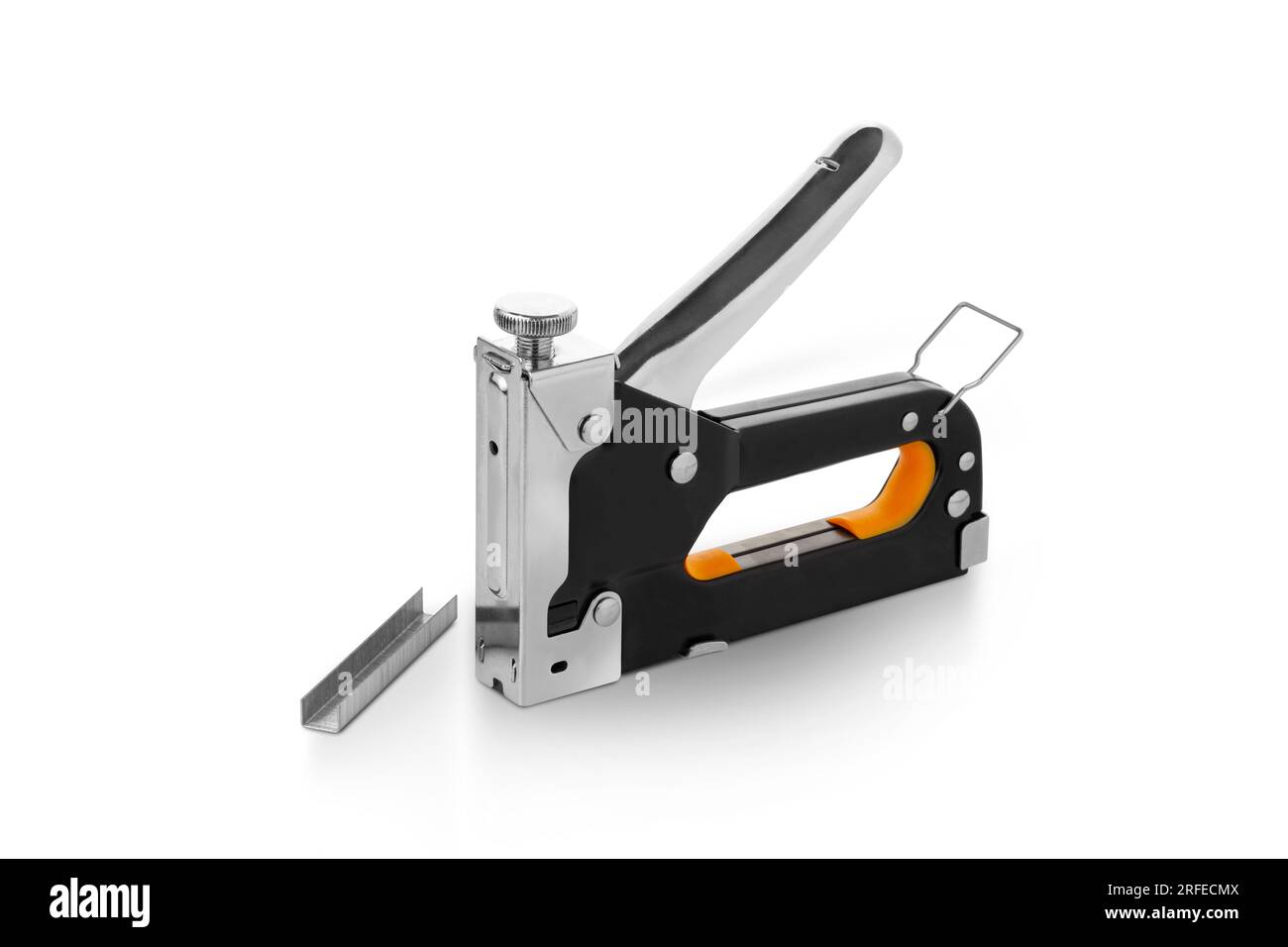 Iron construction stapler and staples isolated on a white background ...